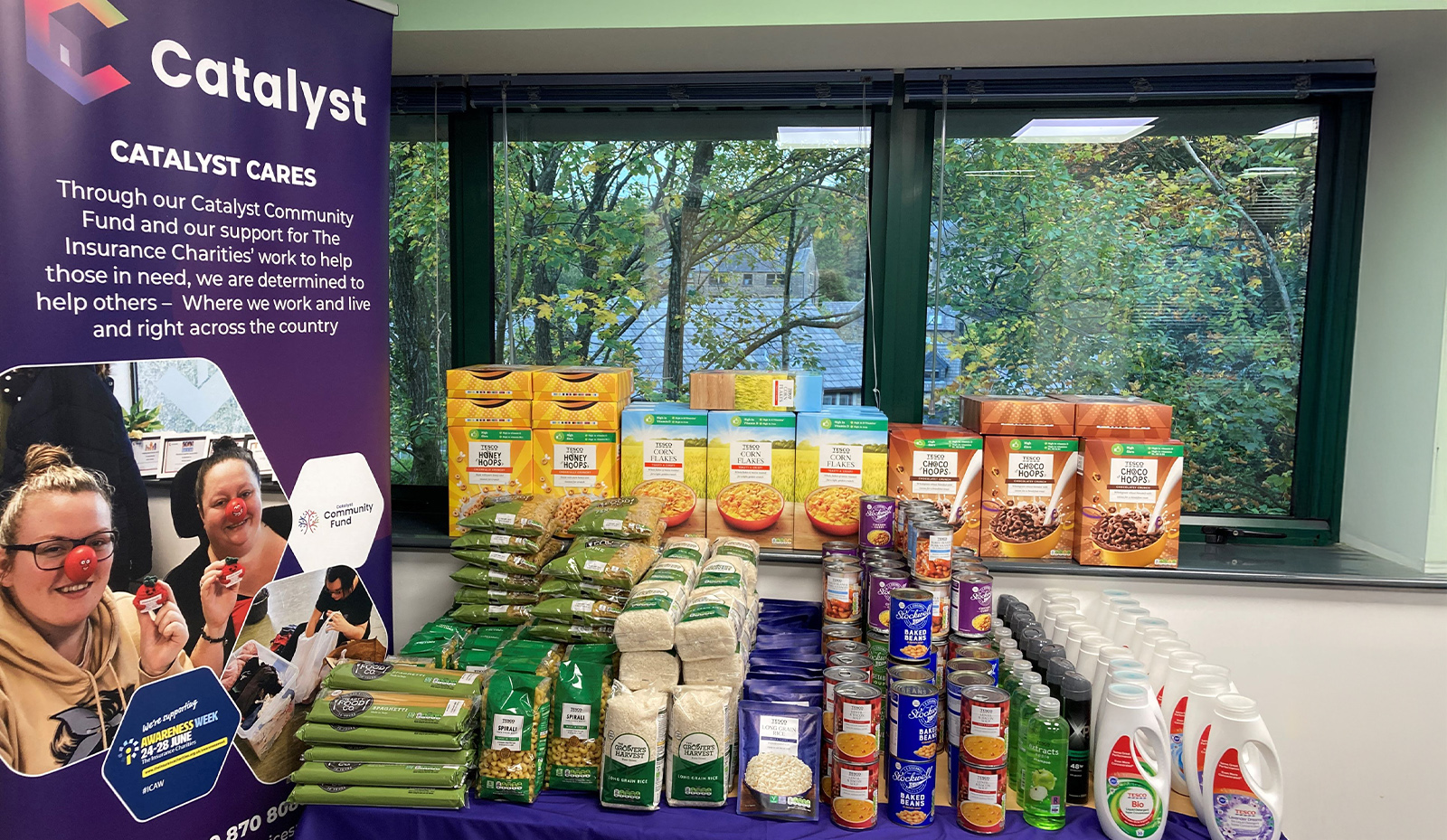 Catalyst team steps up to make donation to food bank - Catalyst